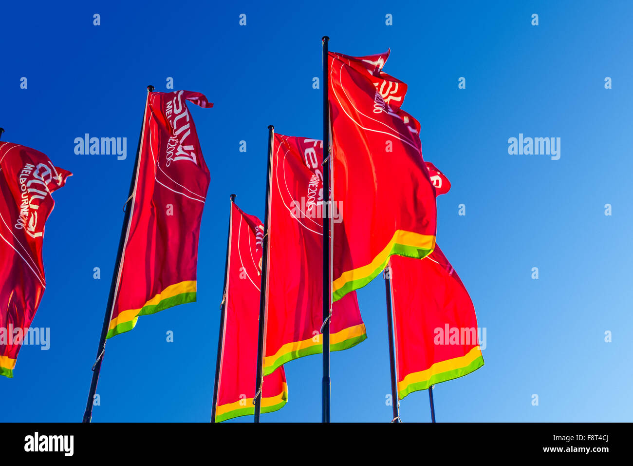 Colourful red flags of the Melbourne festival on the streets of the ...