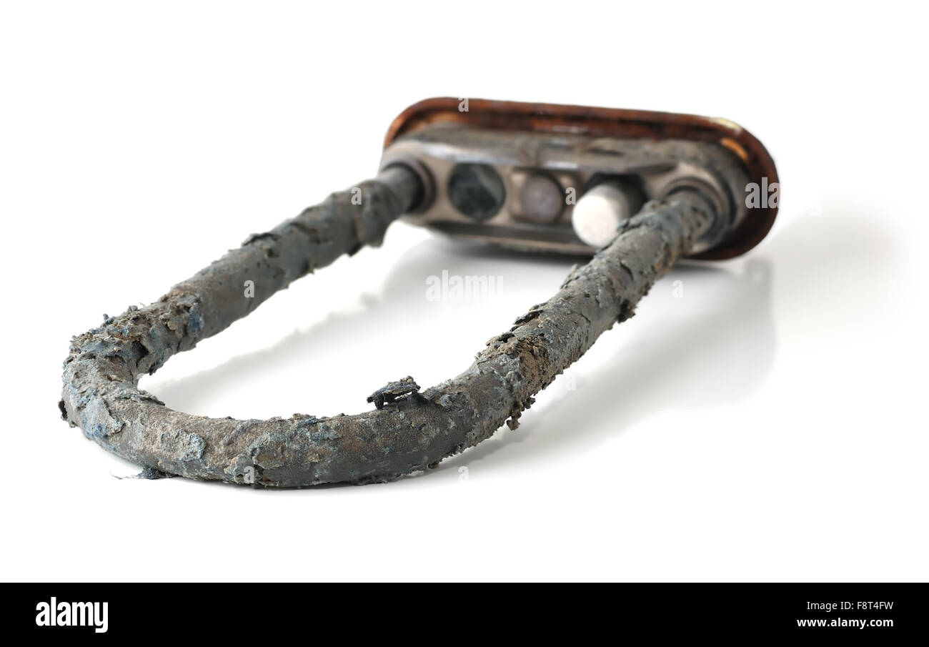 Scale and deposits on the heating element of a washing machine on a ...
