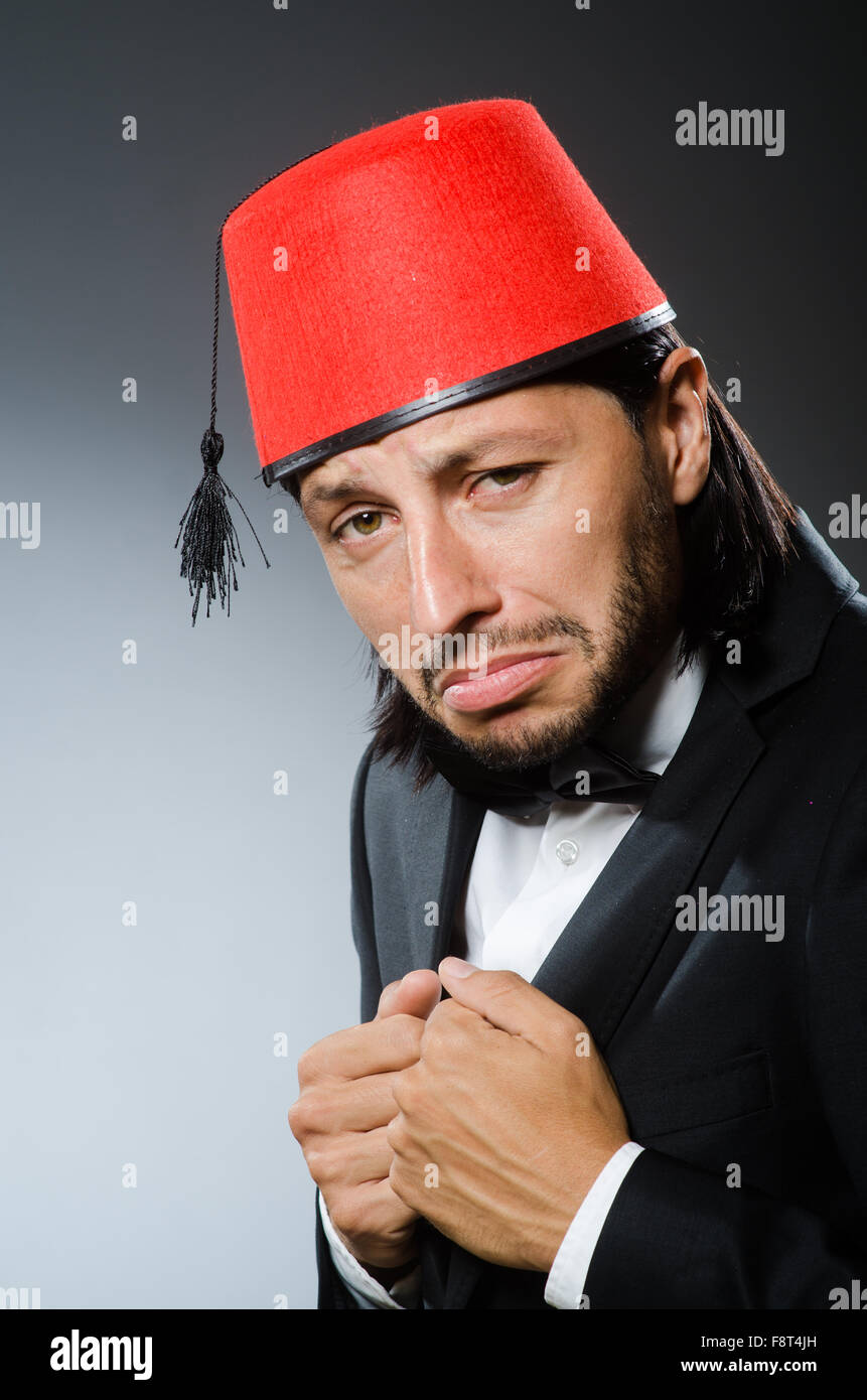 Man in traditional turkish hat and dress Stock Photo - Alamy