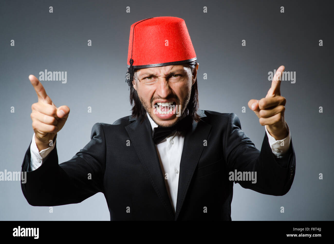 Man in traditional turkish hat and dress Stock Photo - Alamy