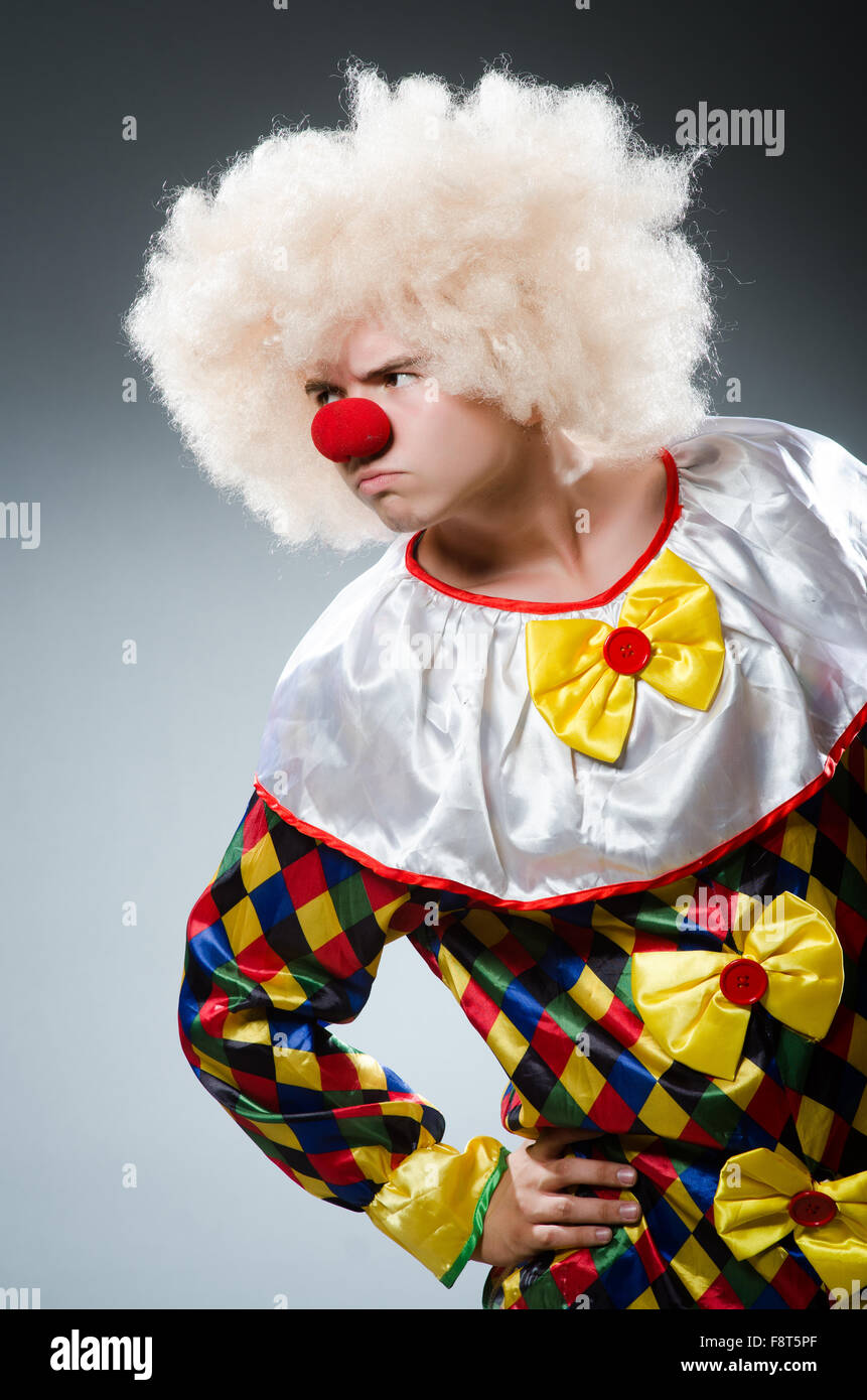 Funny clown in the studio Stock Photo - Alamy