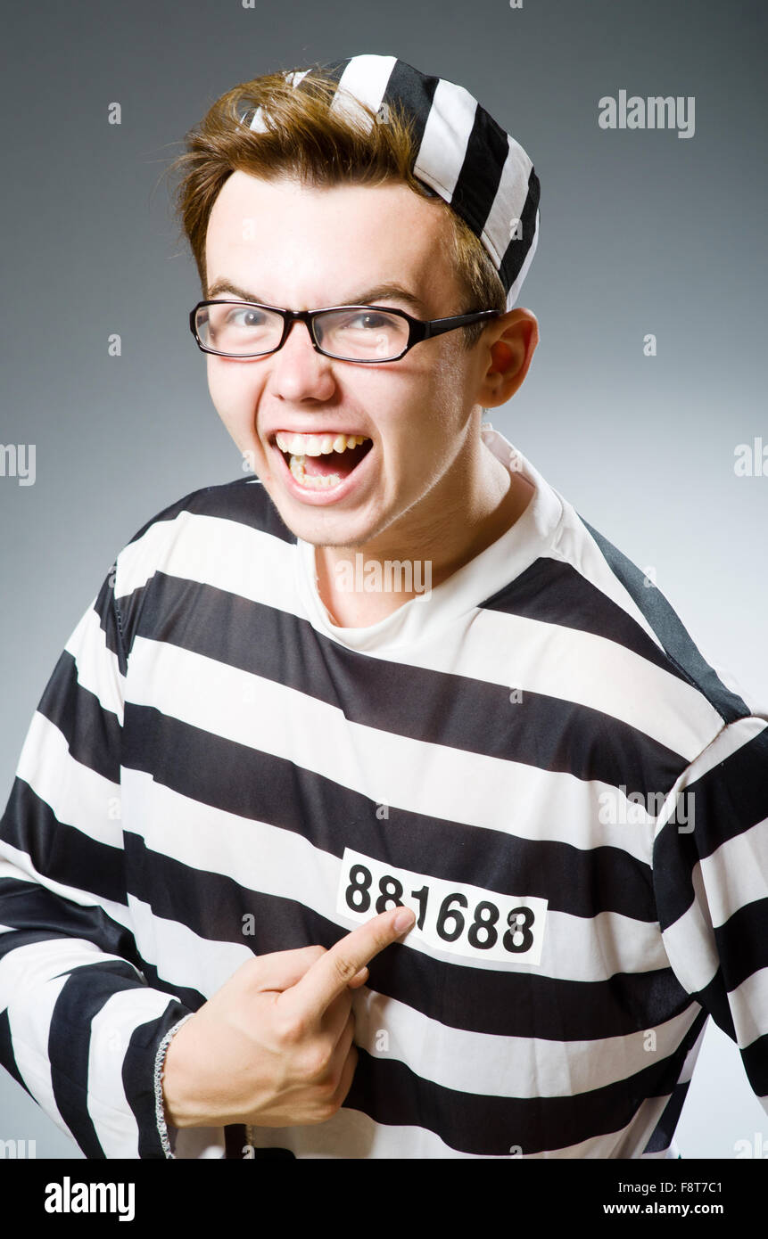 Funny prison inmate in concept Stock Photo - Alamy