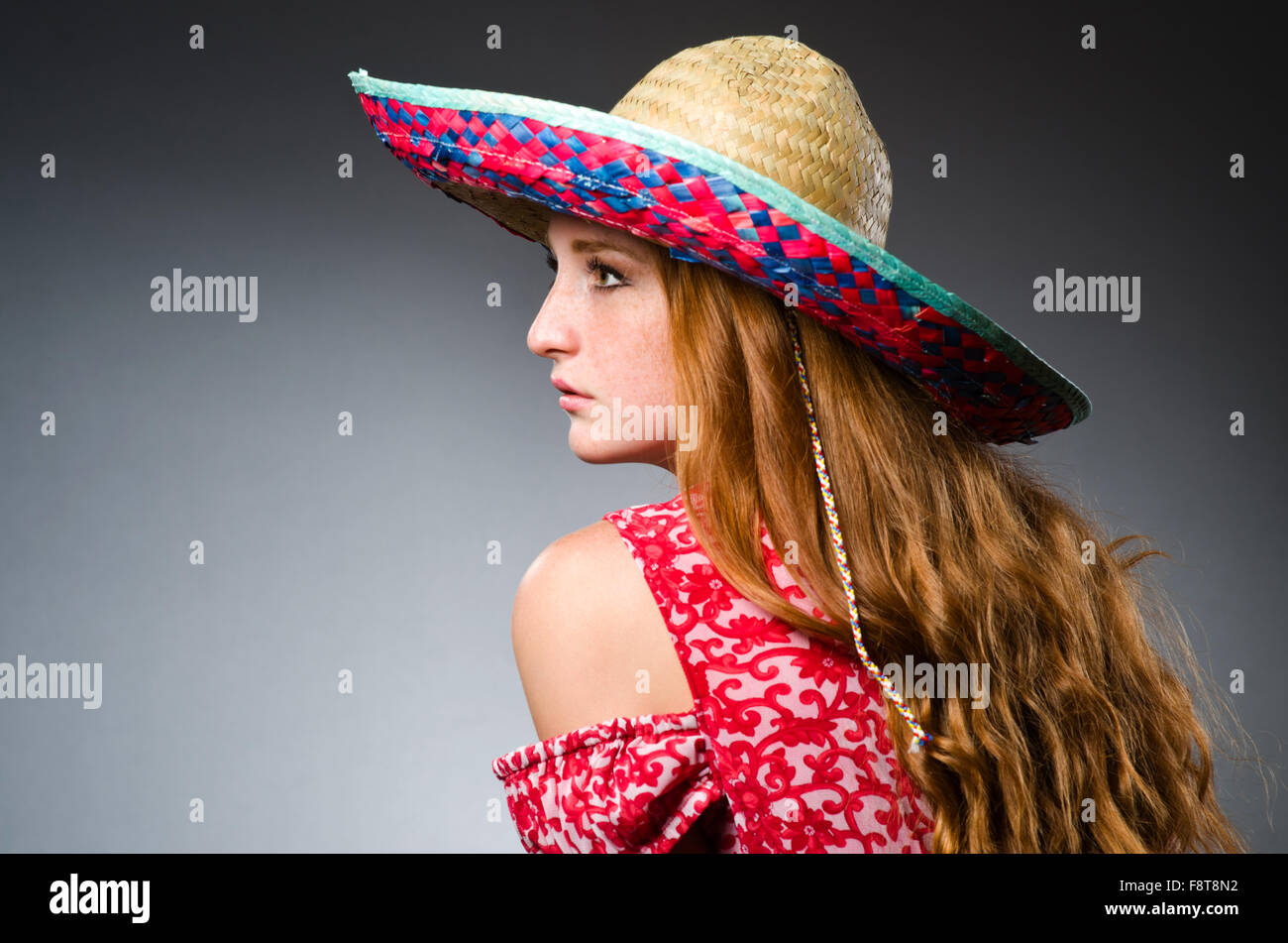 Mexican woman wearing red sombrero Stock Photo - Alamy