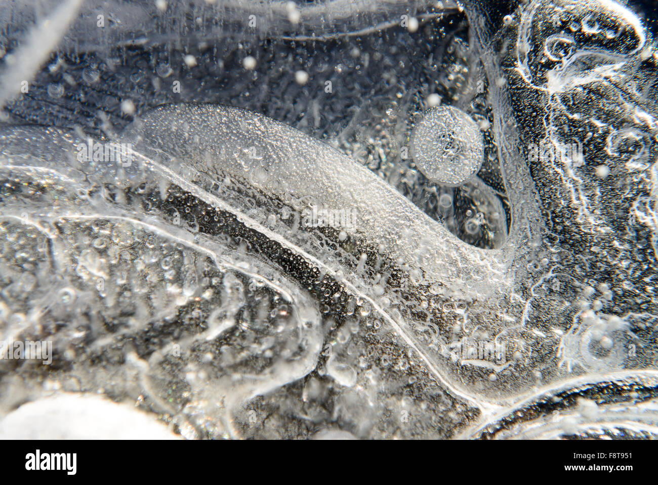 Air bubbles in ice Stock Photo - Alamy