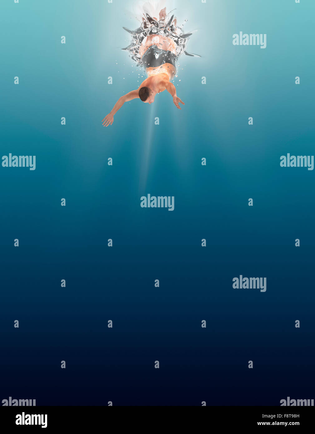 man diving into blue water Stock Photo - Alamy