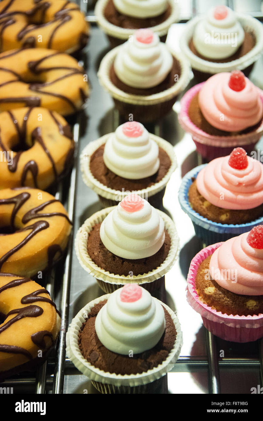 Sweet donuts arranged at display Stock Photo - Alamy