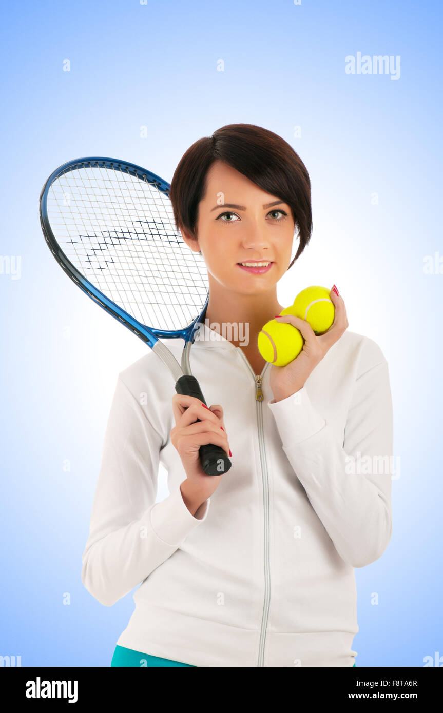 Young girl with tennis racket and bal isolated on white Stock Photo - Alamy