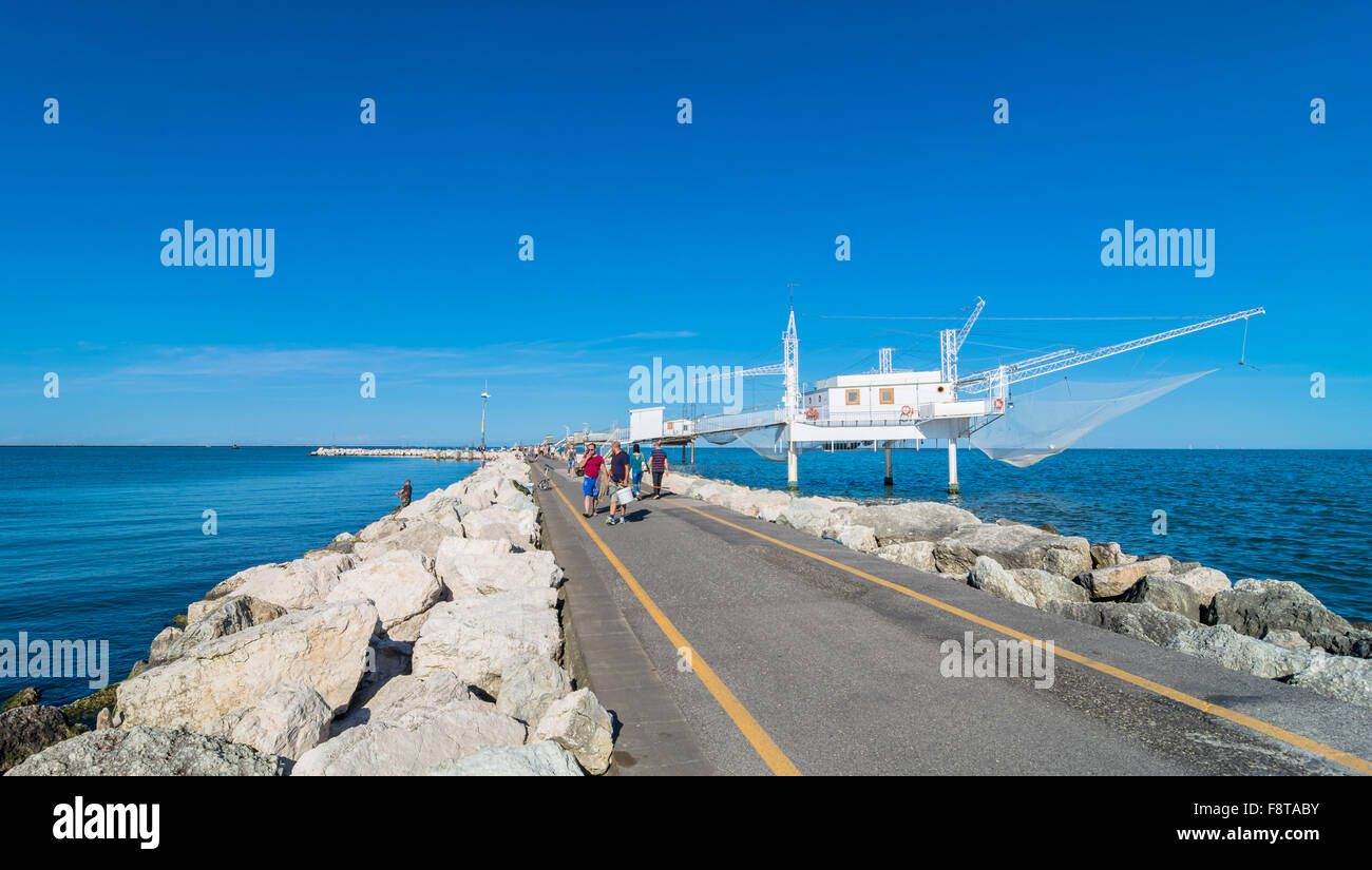 pier with tourists and adriatic sea in Marina di Ravenna, Italy Stock ...