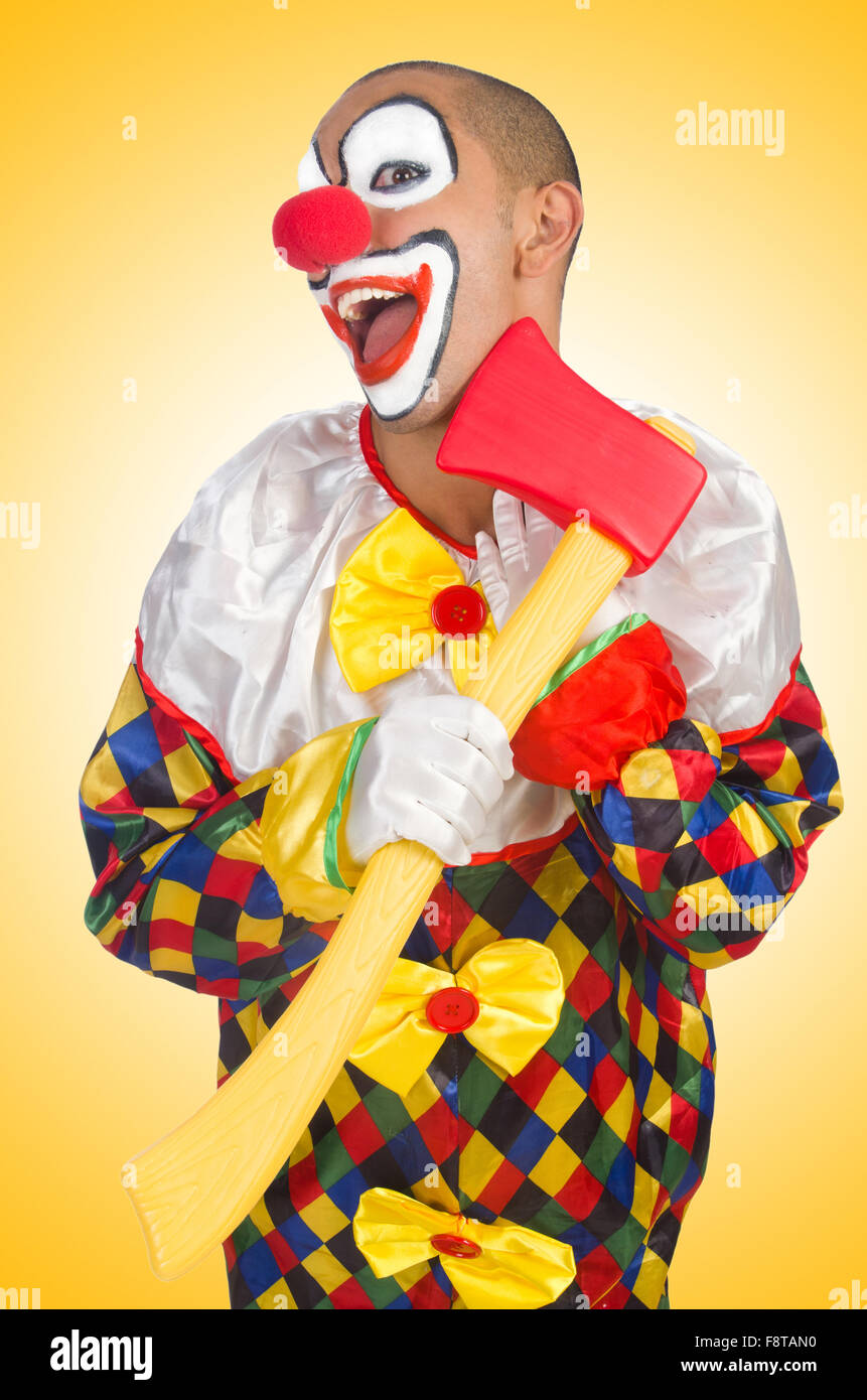 Clown with axe isolated on white Stock Photo - Alamy