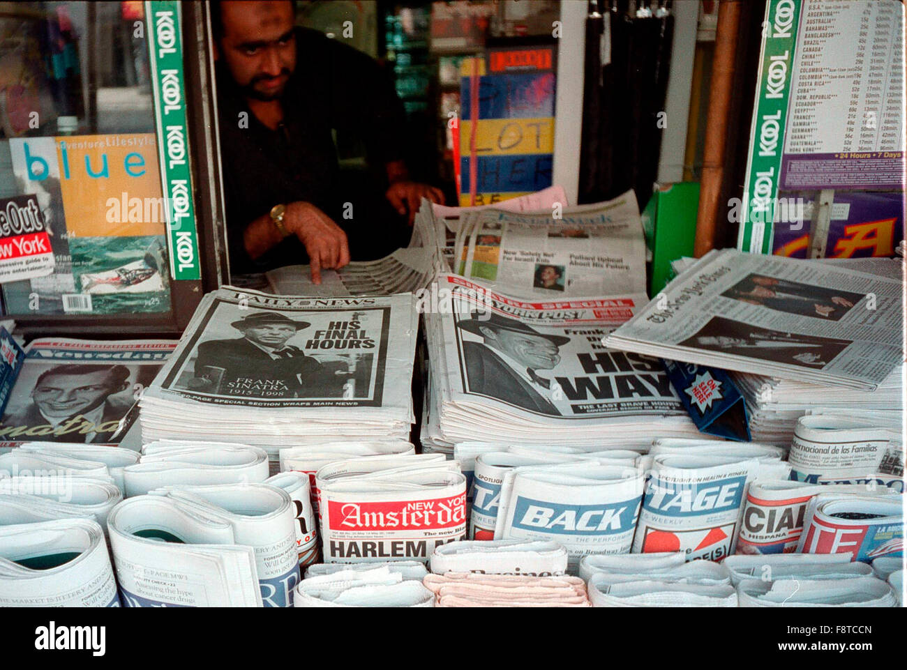 A newsstand in New York on May 14, 1998 showcases newspapers with ...