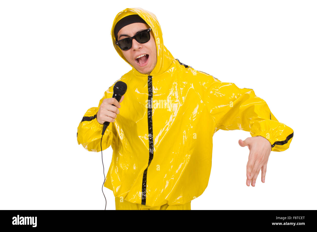 Funny performer with mic isolated on the white Stock Photo - Alamy