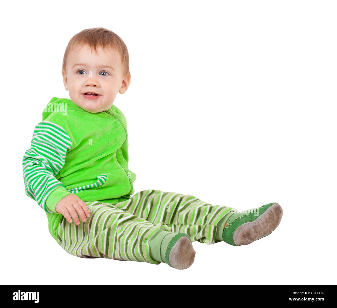 Sitting toddler. Isolated over white background Stock Photo - Alamy