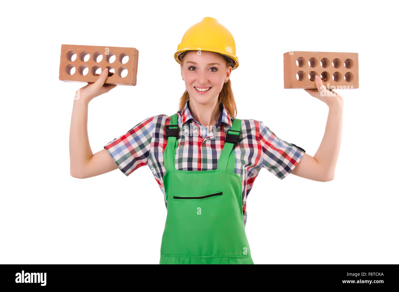 Woman with bricks isolated on white Stock Photo - Alamy