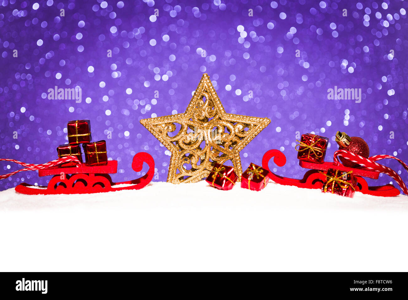 christmas star in snow on glitter background Stock Photo - Alamy