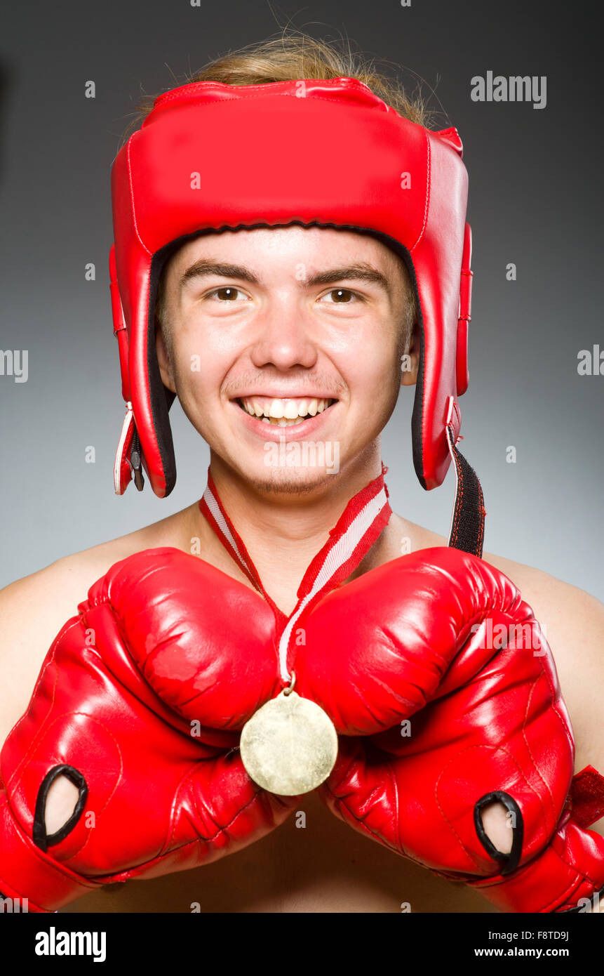 Funny boxer with winning gold medal Stock Photo - Alamy