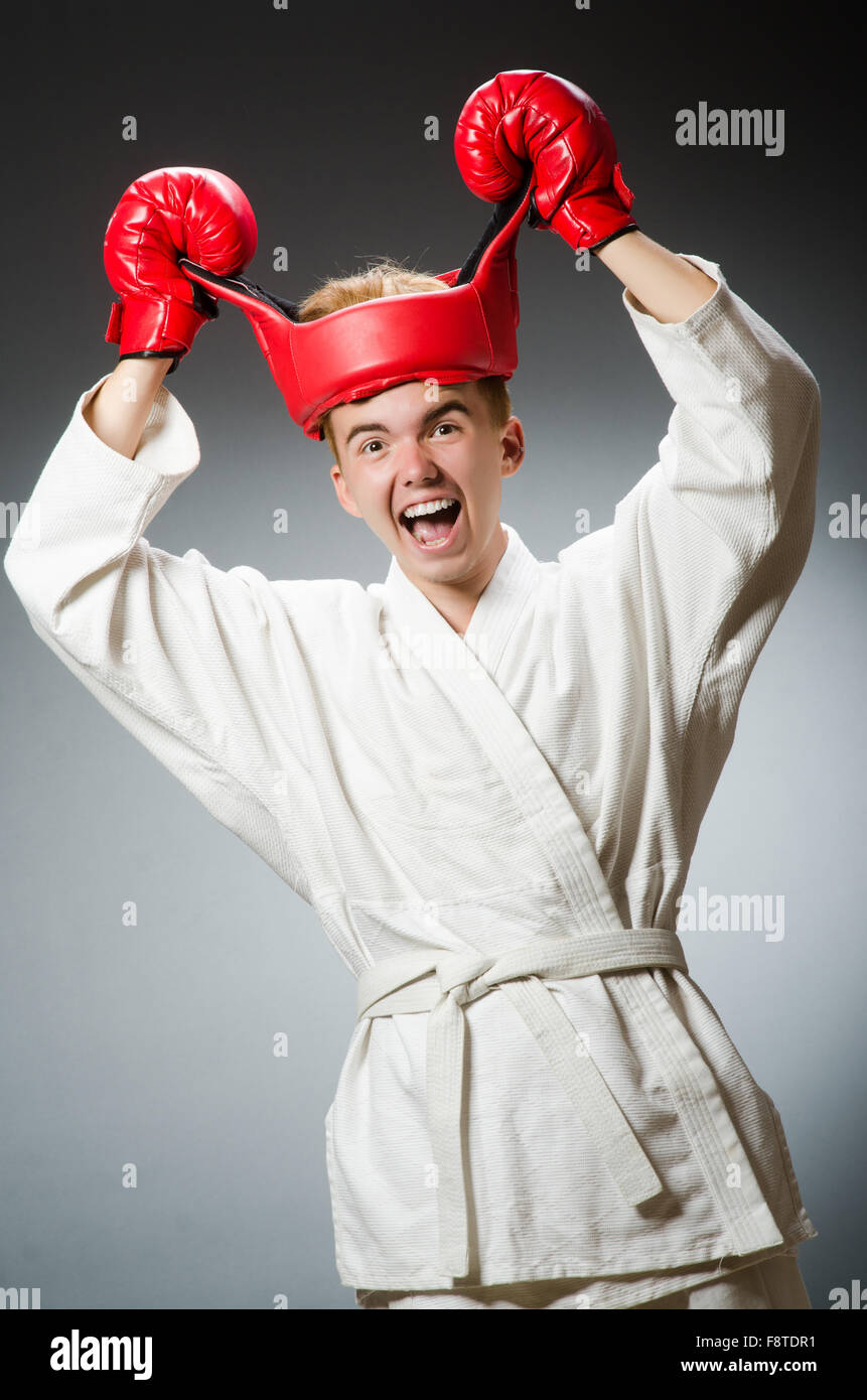 Funny boxer against dark background Stock Photo - Alamy