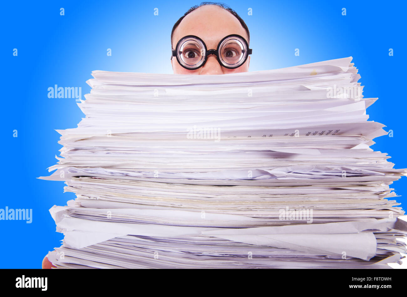 Funny man with lots of folders on white Stock Photo - Alamy