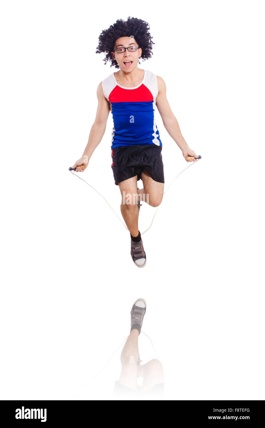 Guy jumps with skipping rope isolated on white Stock Photo - Alamy