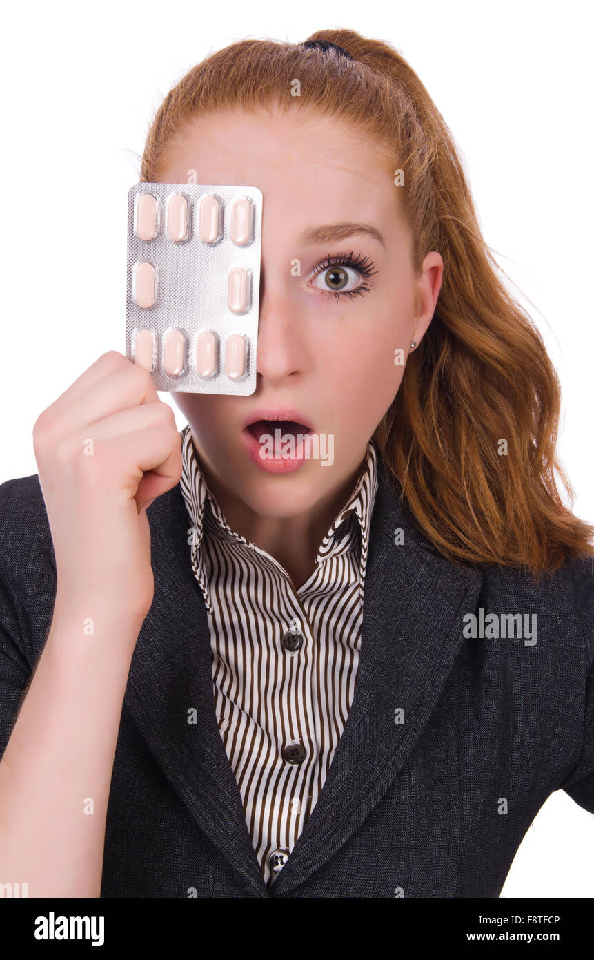 Young woman with pills isolated on white Stock Photo - Alamy