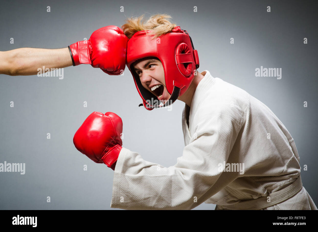Funny boxer against dark background Stock Photo - Alamy