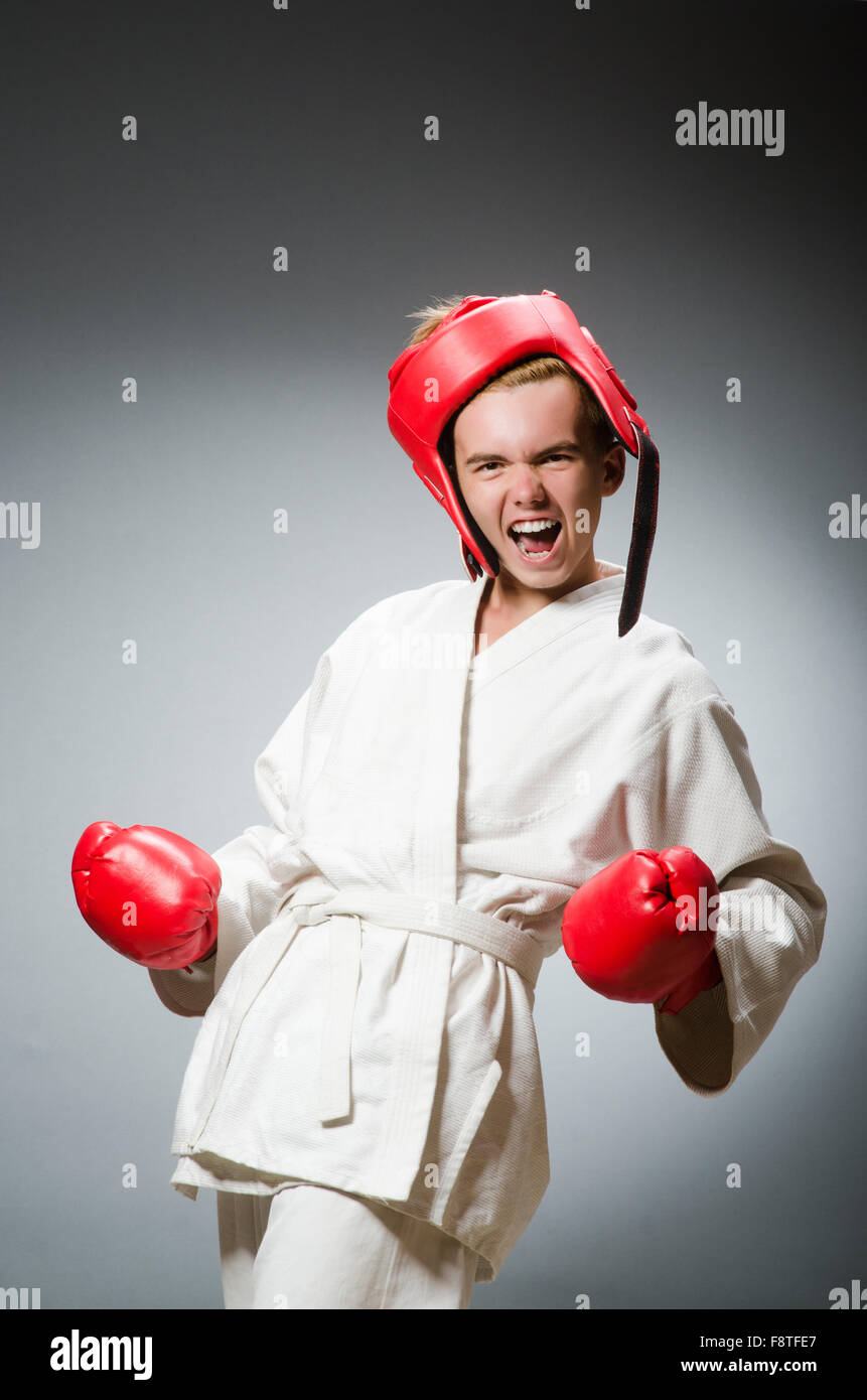 Funny boxer against dark background Stock Photo - Alamy