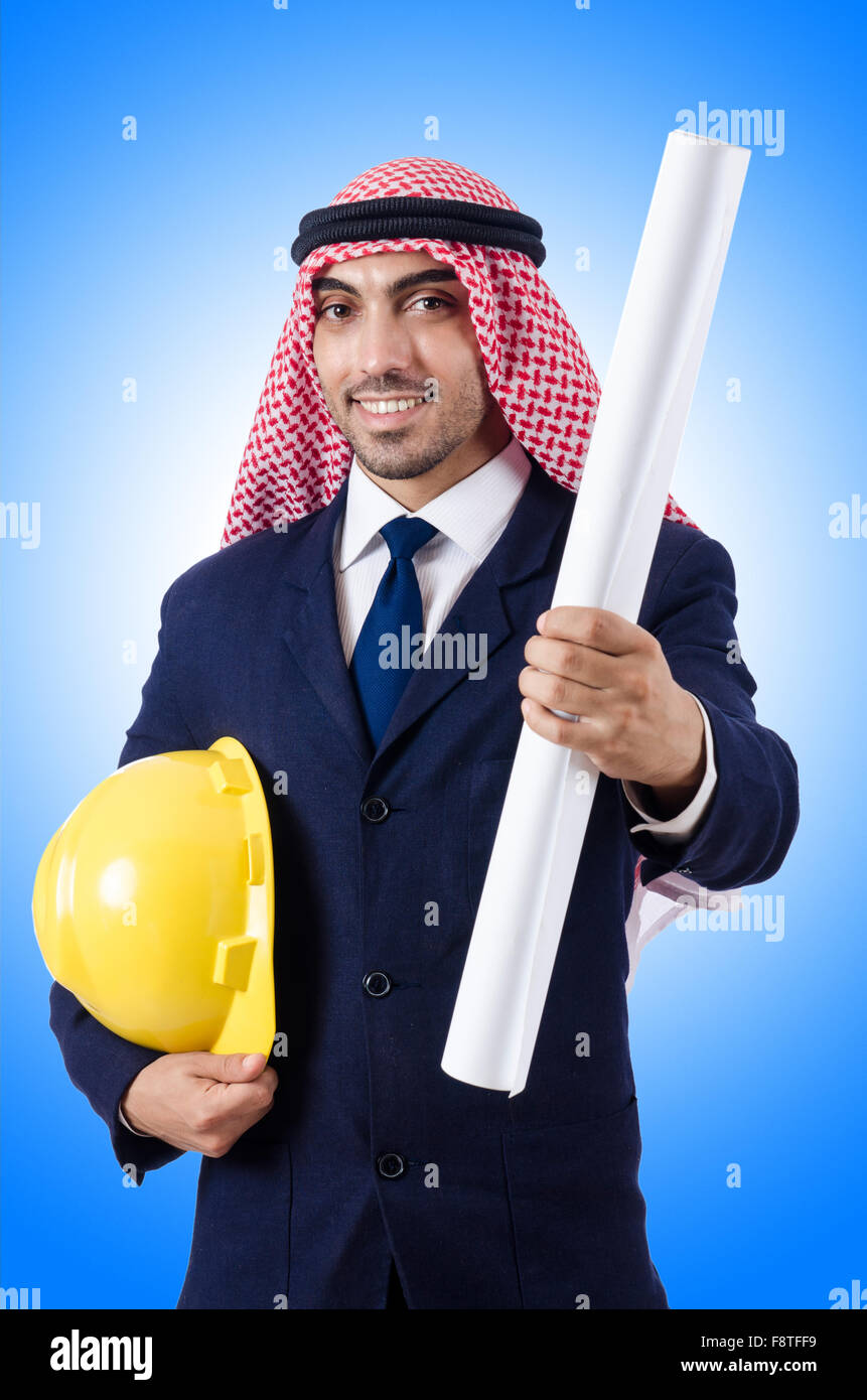 Arab engineer with drawings on white Stock Photo - Alamy