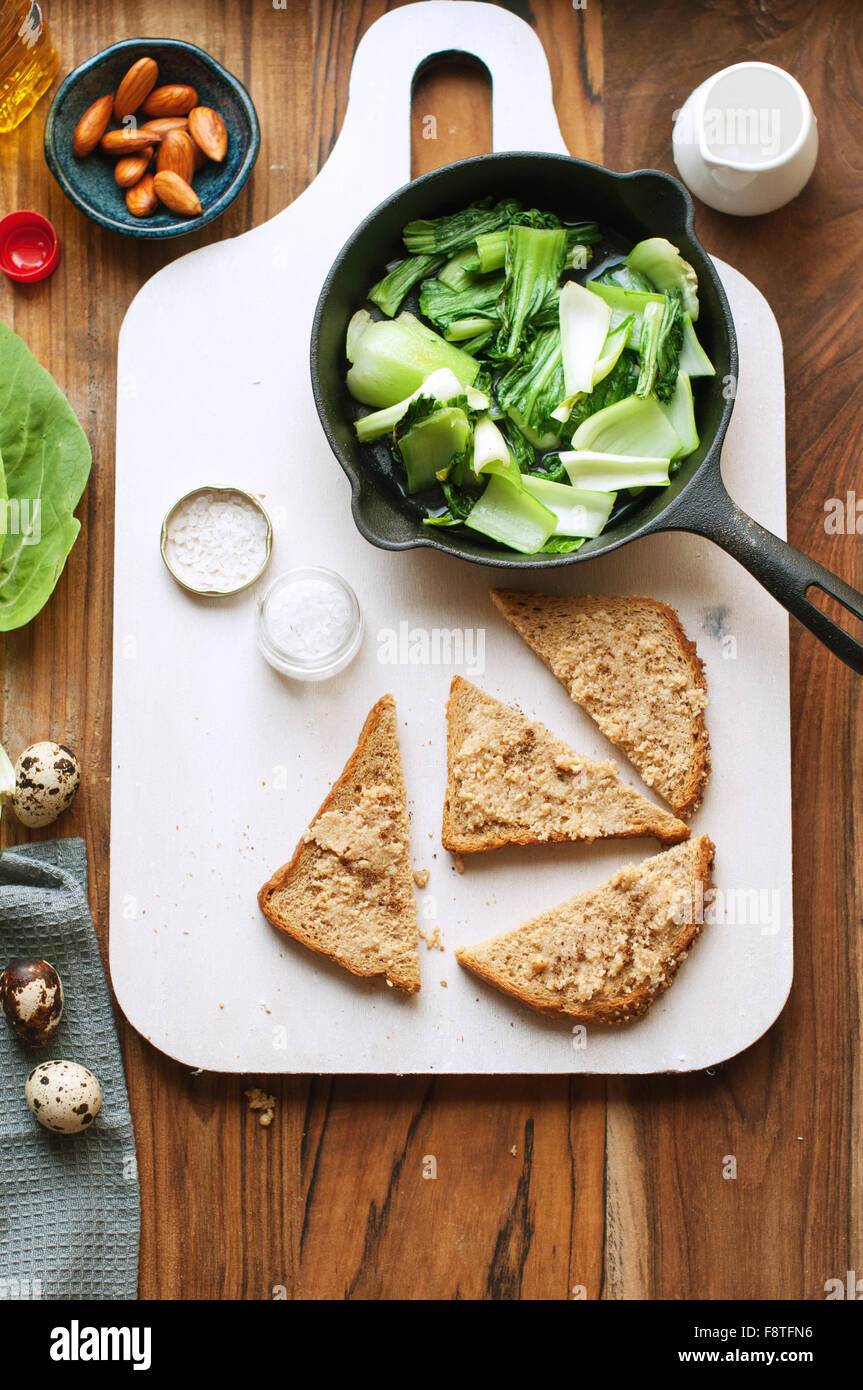 Peanut butter spread on bread slices with breakfast layout Stock Photo ...