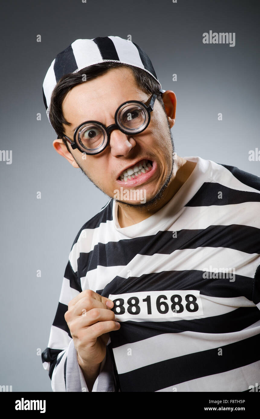 Prison inmate in funny concept Stock Photo - Alamy