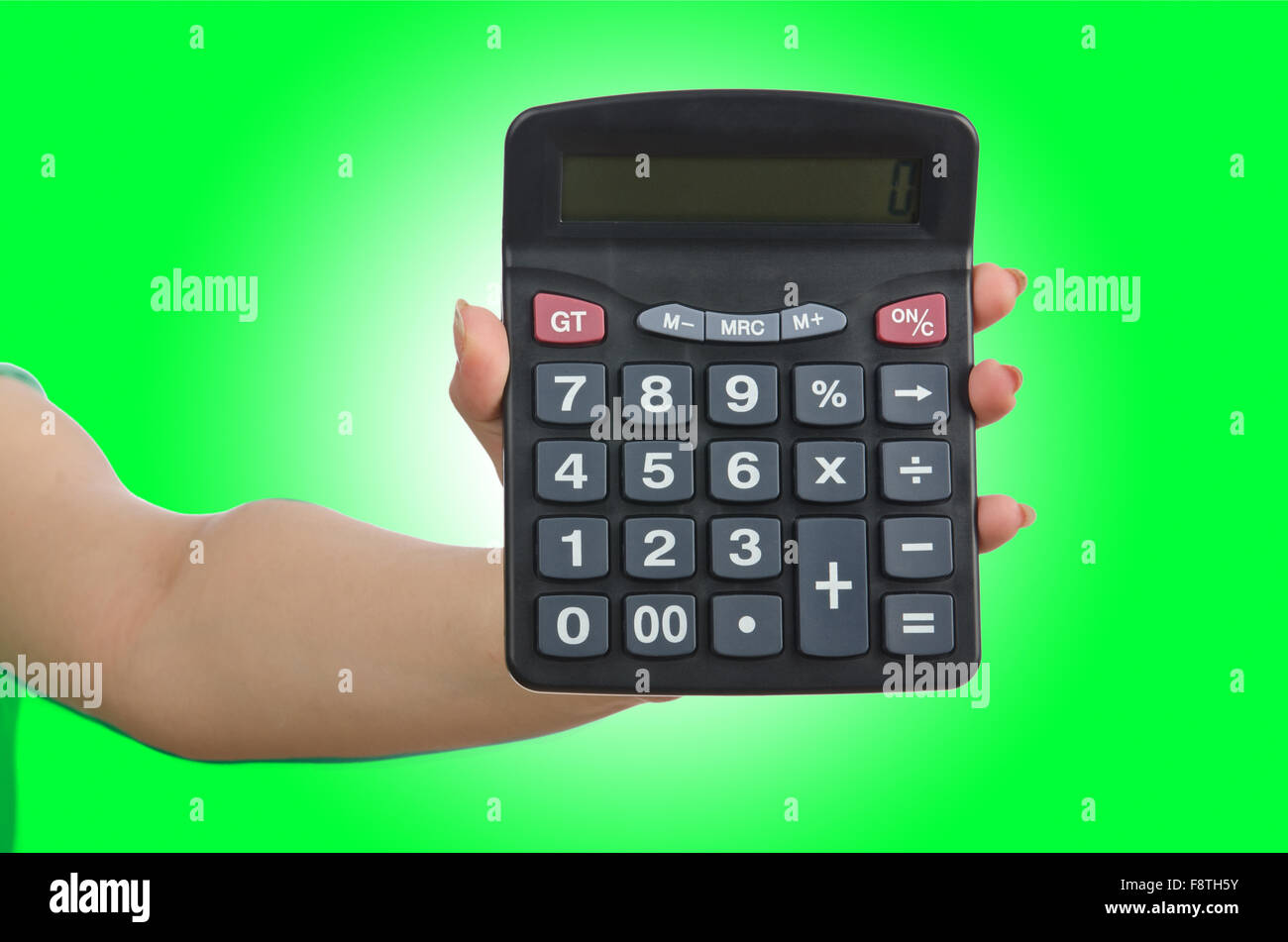 Hand holding calculator on white Stock Photo - Alamy