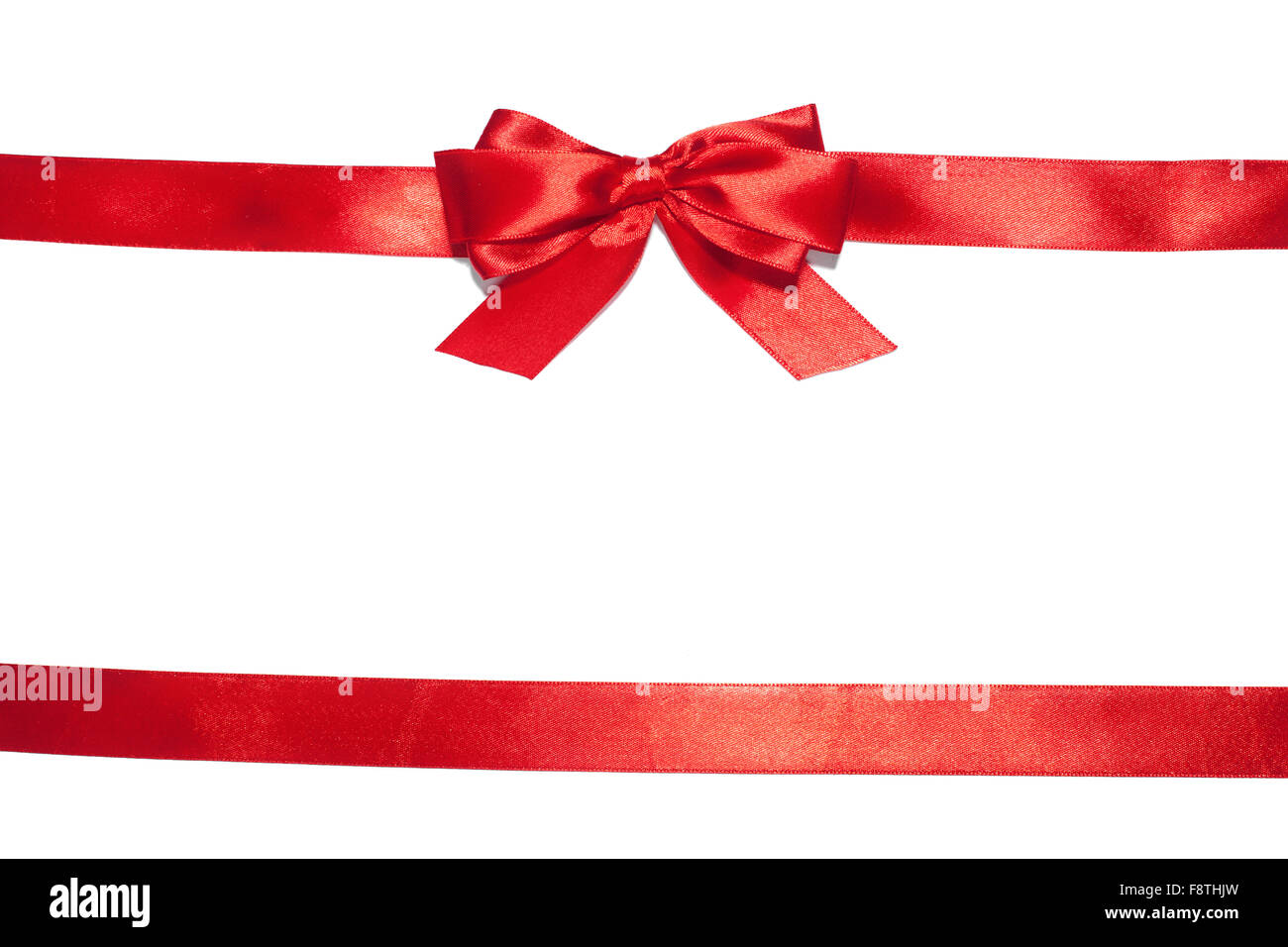 Red ribbon with bow on white Stock Photo - Alamy
