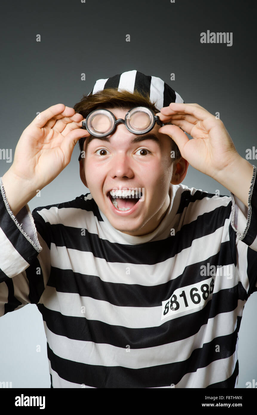 Prison inmate in funny concept Stock Photo - Alamy