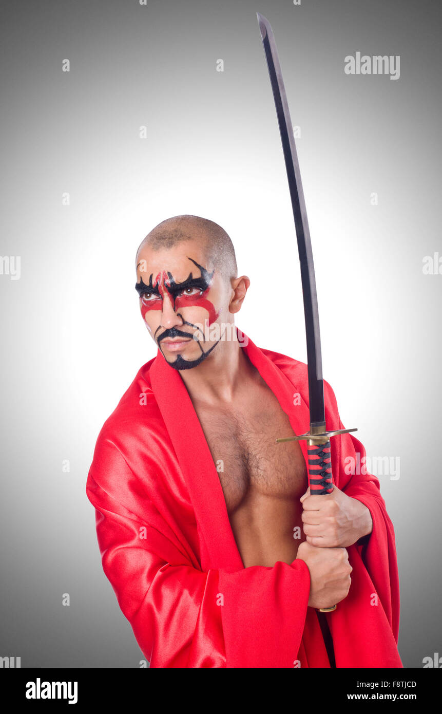 Man with sword isolated on white Stock Photo - Alamy