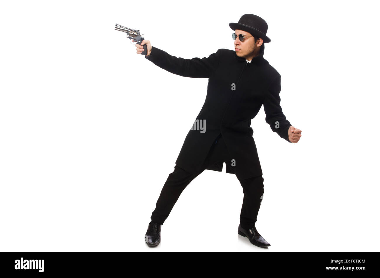 Young man with gun isolated on white Stock Photo - Alamy