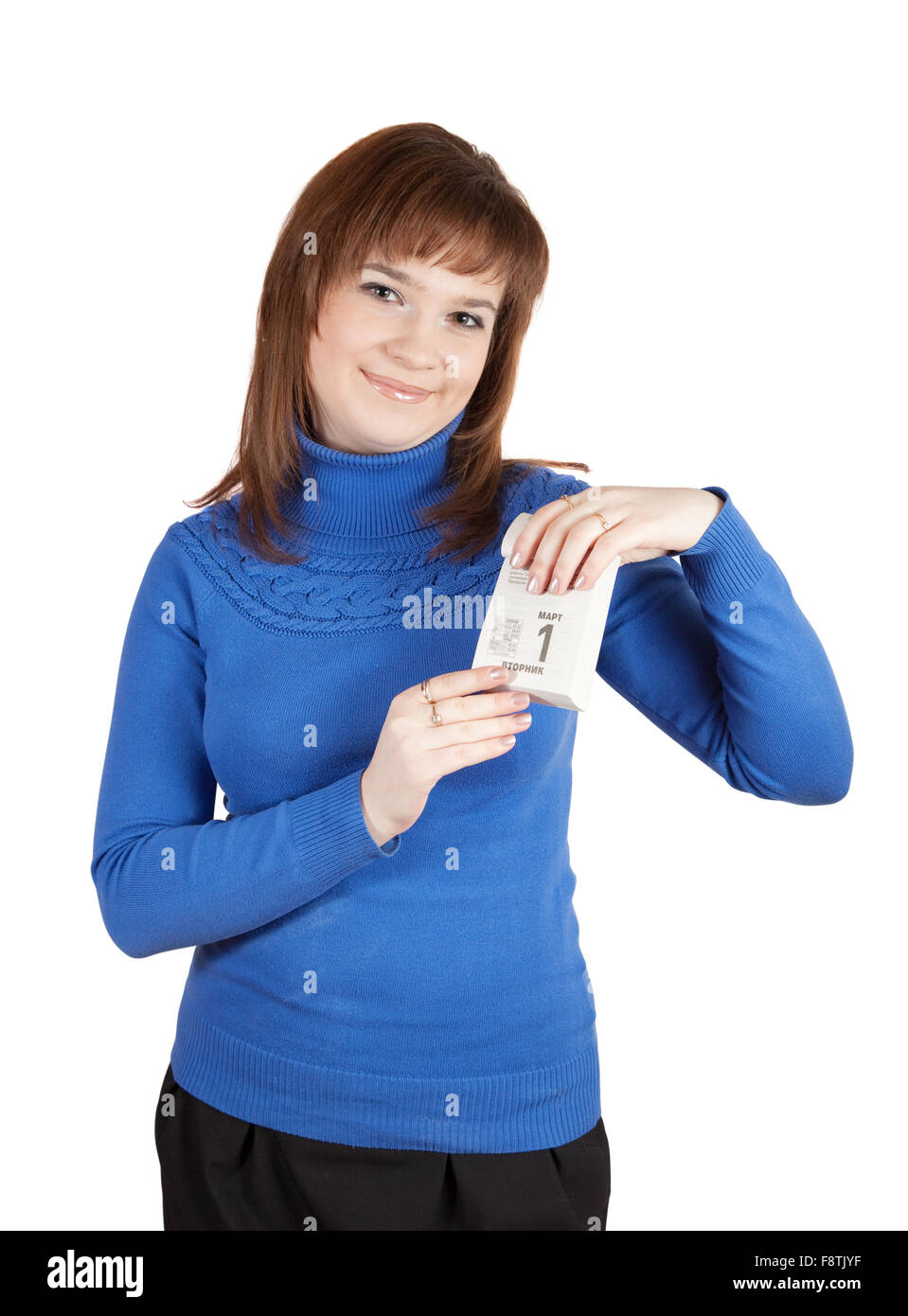 Girl holding tear-off calendar. Isolated over white Stock Photo - Alamy