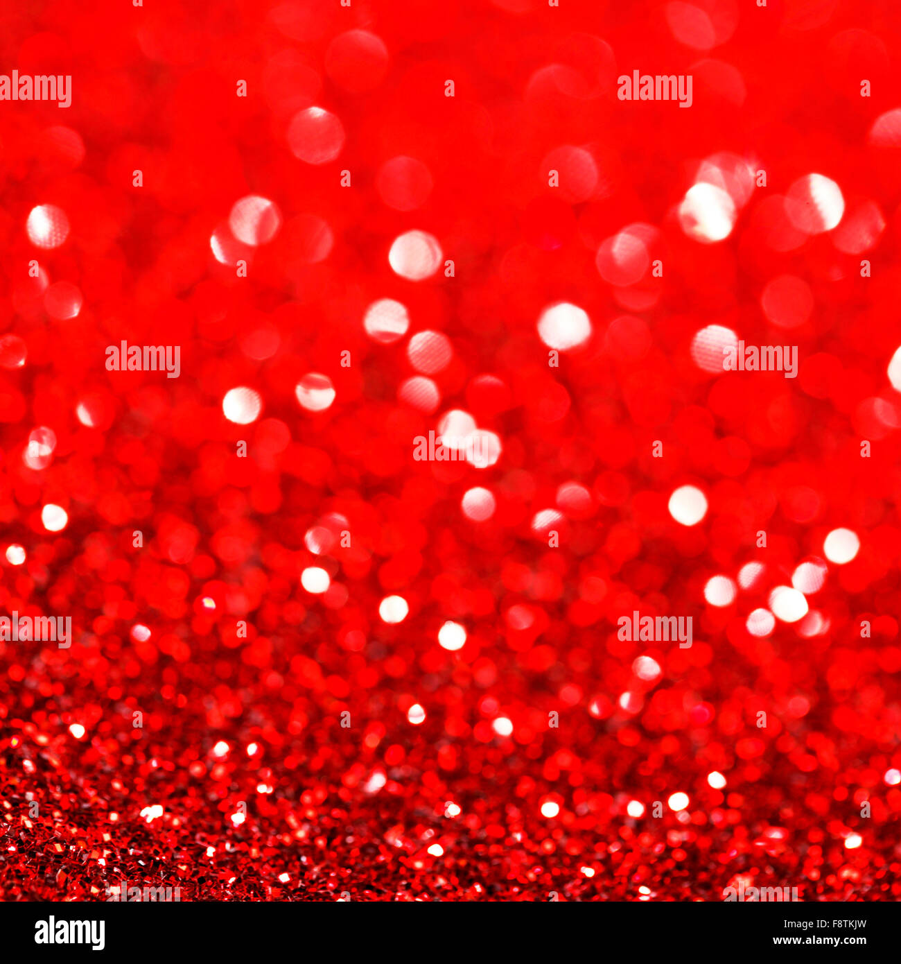 Red festive glitter background with defocused lights Stock Photo - Alamy