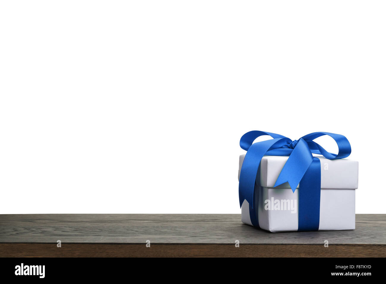 border with white gift box with blue ribbon bow Stock Photo - Alamy