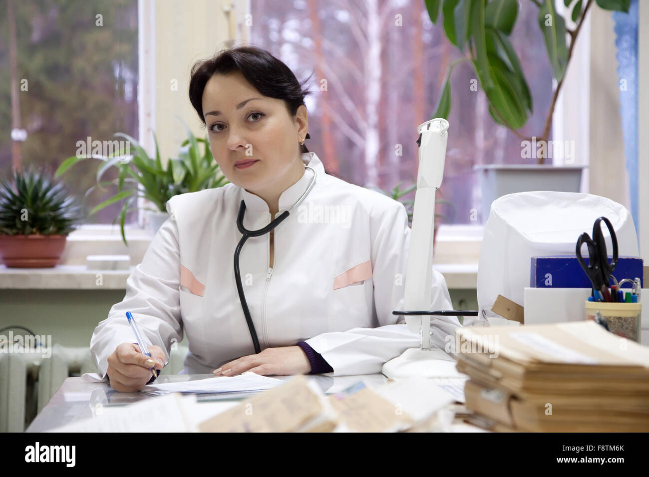Portrait of female doctor in clinic interior Stock Photo - Alamy