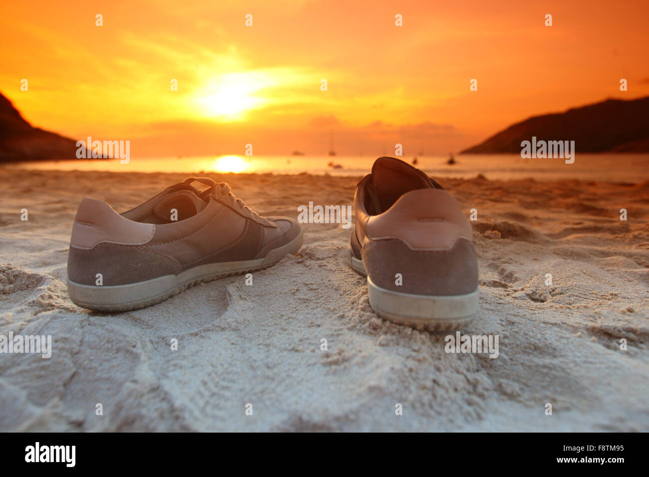 Shoes on beach hi-res stock photography and images - Alamy