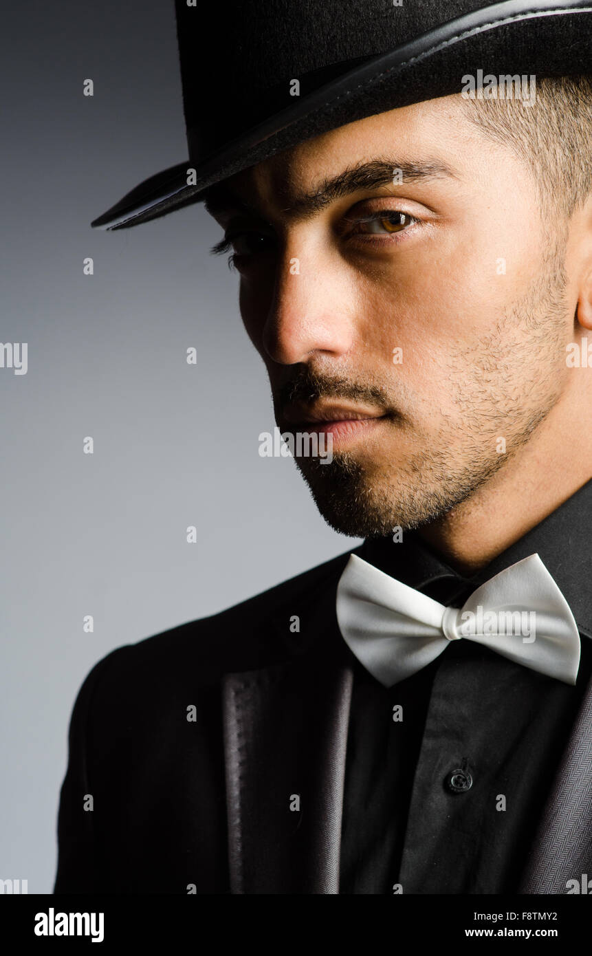 Man with hat in vintage concept Stock Photo - Alamy