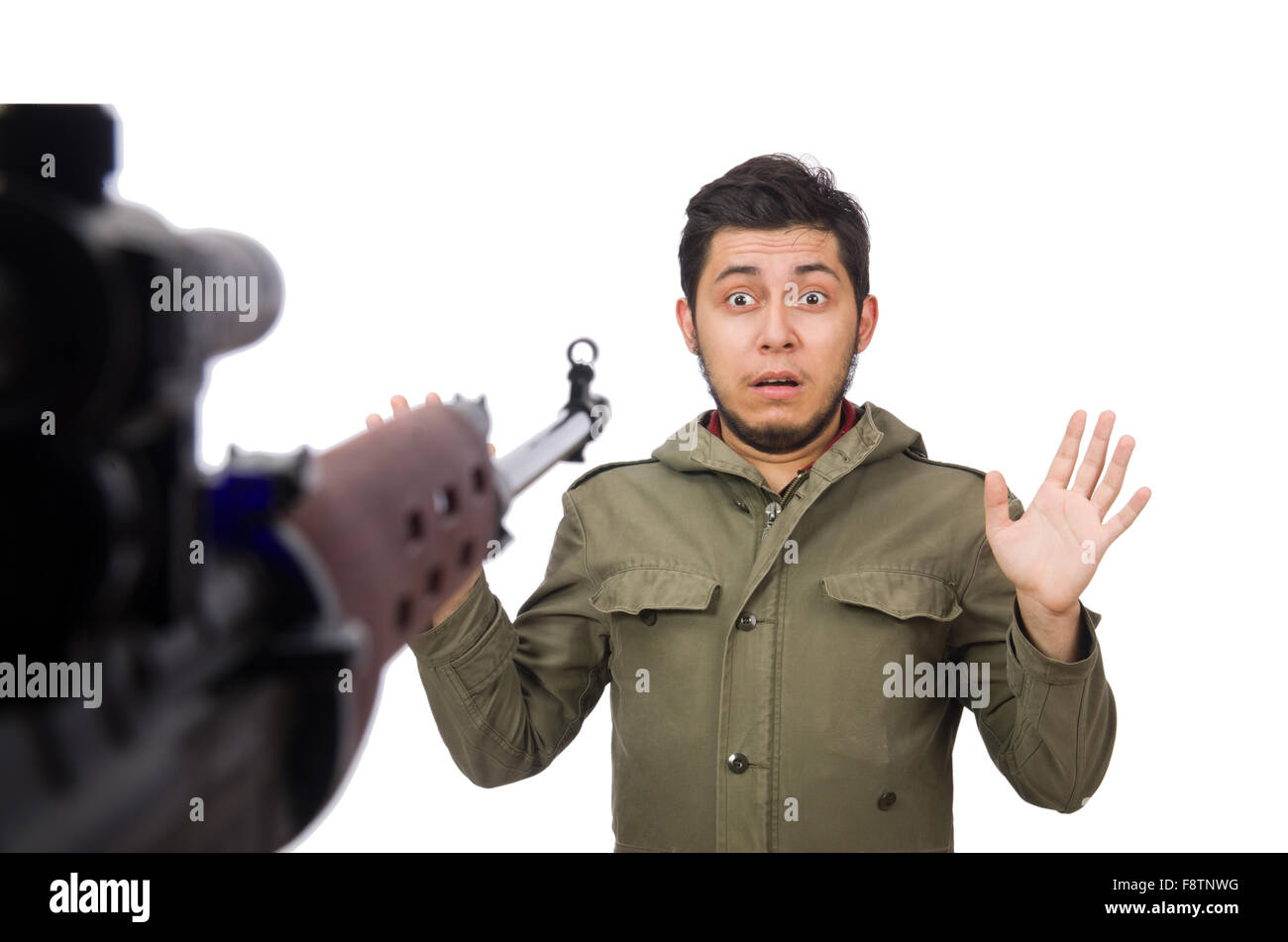 Man with a gun isolated on white Stock Photo - Alamy