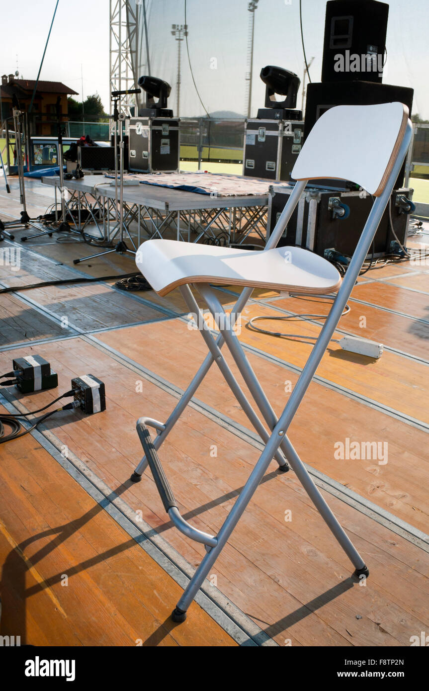 Chair on stage Stock Photo - Alamy