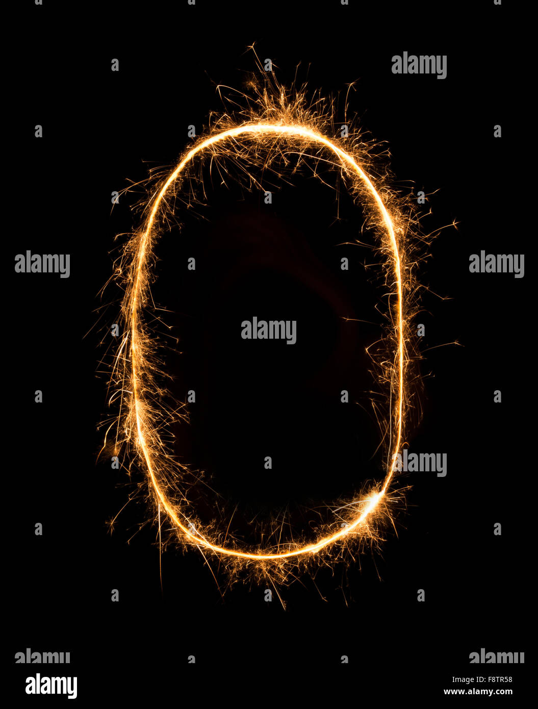 0.Digit zero made of firework sparklers at night background Stock Photo ...