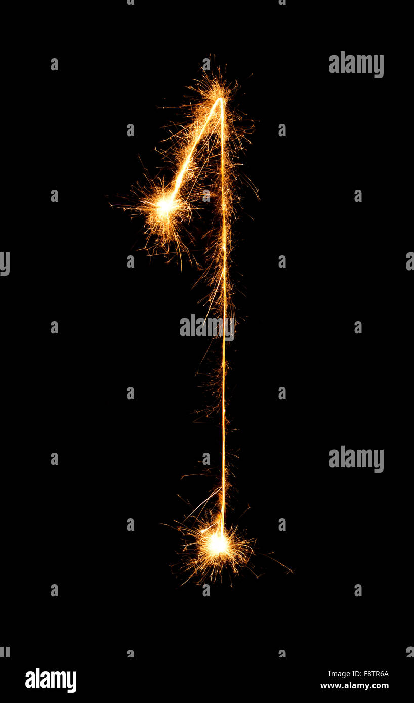 1.Digit one made of firework sparklers at night background Stock Photo ...