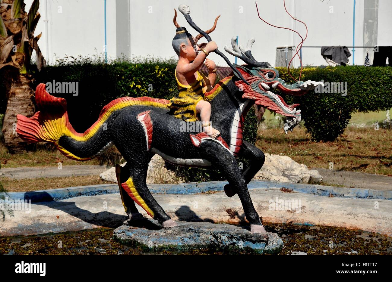 Bang Saen, Thailand: Sculpture of a warrior riding a dragon in the ...