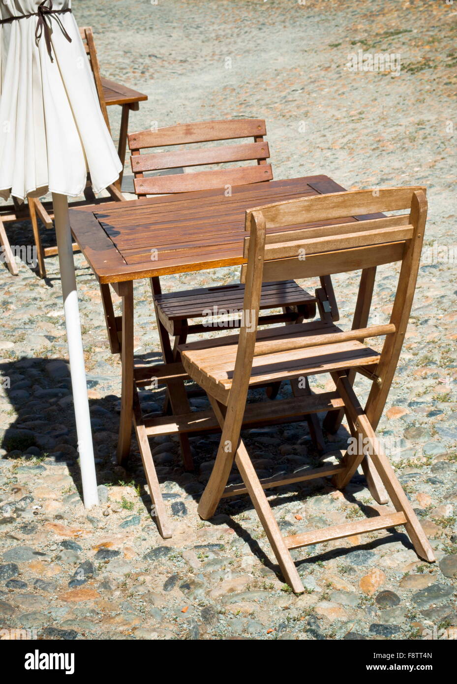 Wooden table and chair Stock Photo - Alamy