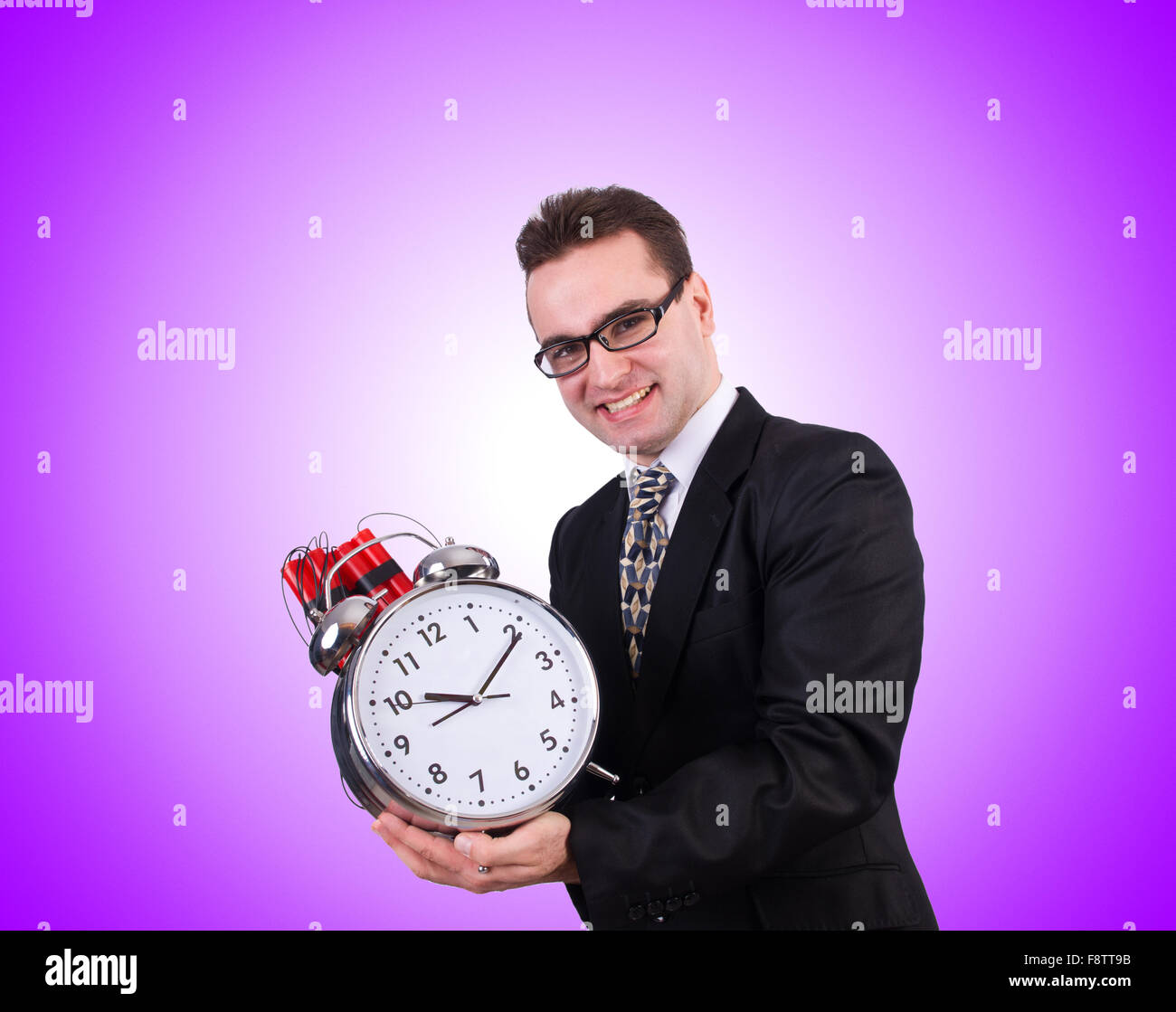 Man with time bomb against the gradient Stock Photo - Alamy