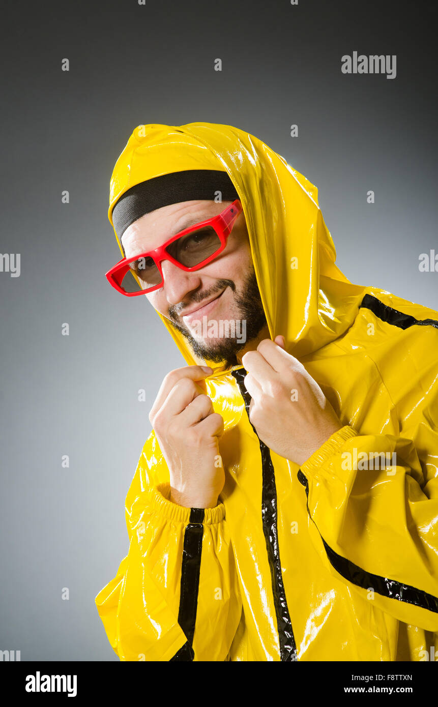 Funny man wearing yellow suit Stock Photo - Alamy