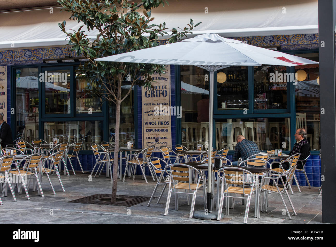 Outside of a very pleasant bar in Marbella in Spain with two people ...