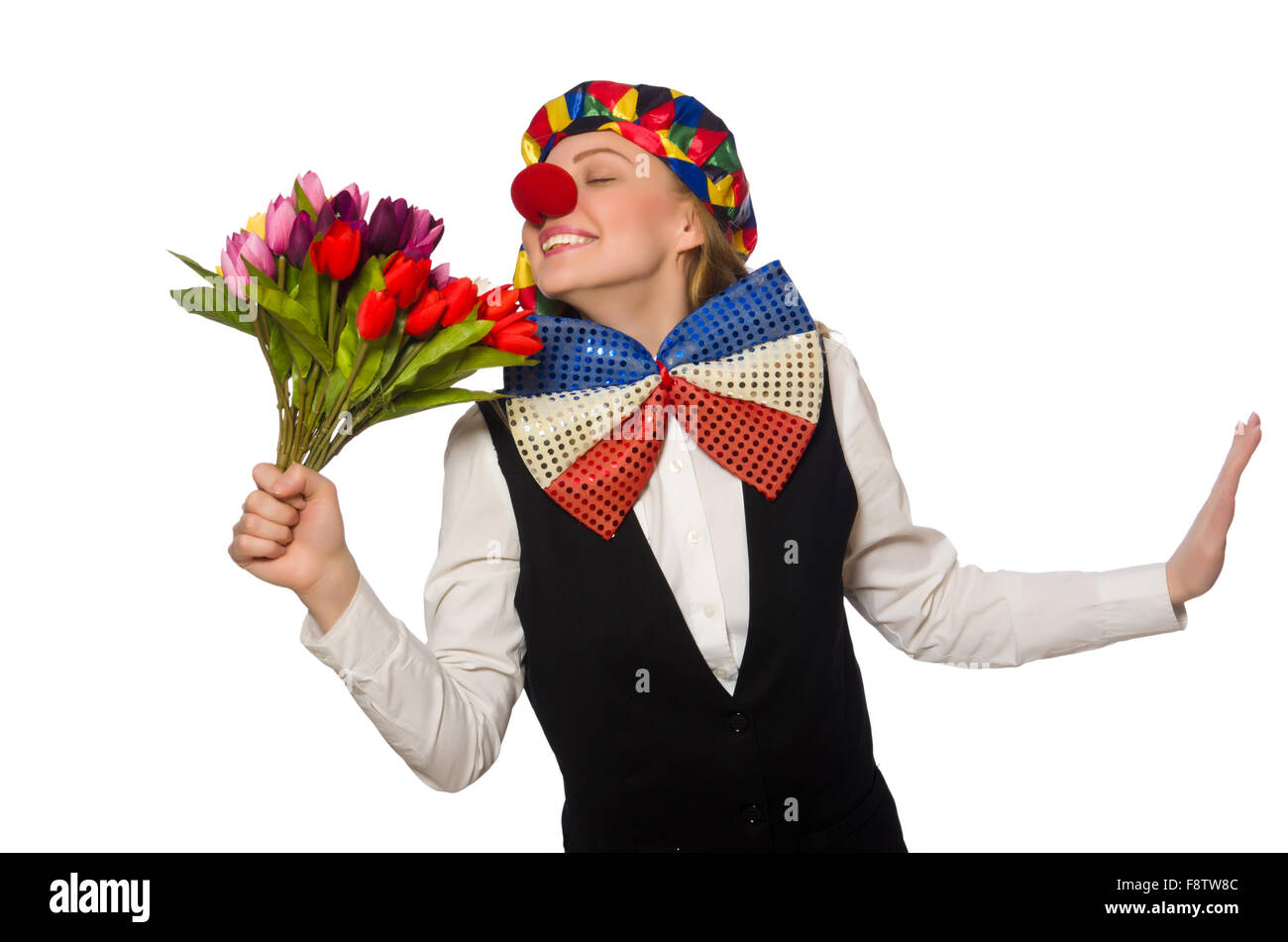 Pretty female clown with flowers isolated on white Stock Photo - Alamy