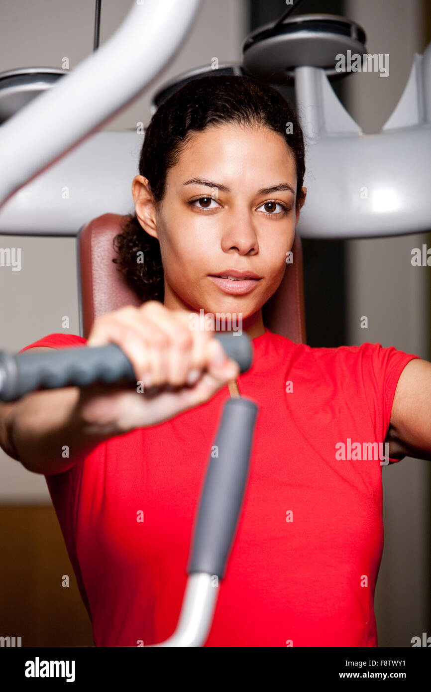 Beautiful girl working out at the gym Stock Photo - Alamy